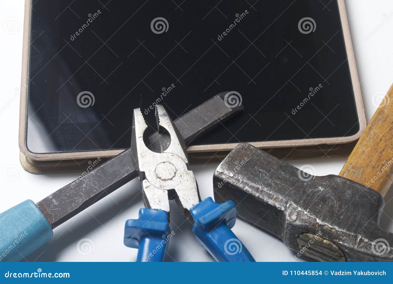 Tablet and Working Tools. on the White Surface of the Table is a Tablet ...