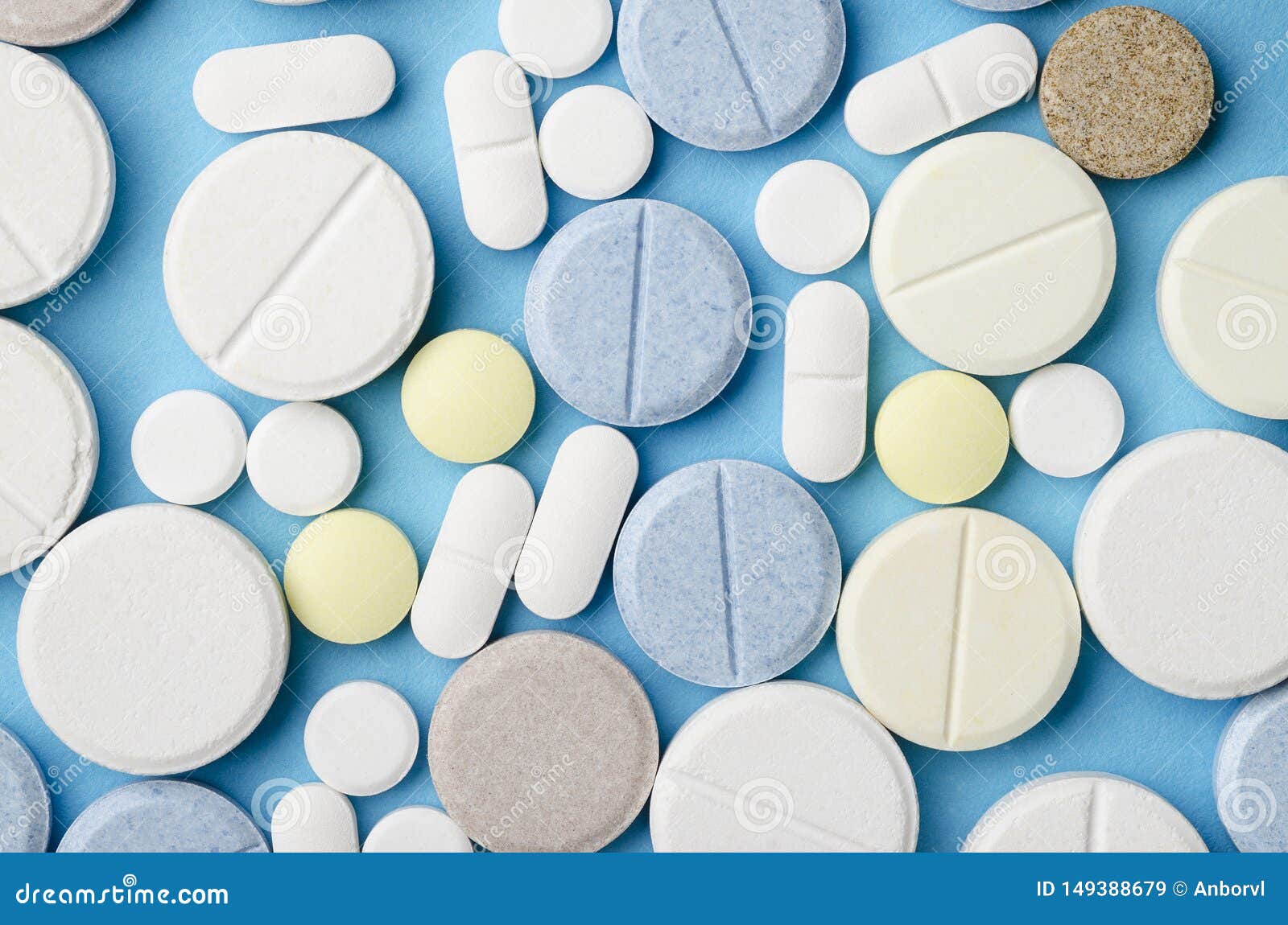 Tablets of Different Shapes and Colors on a Blue Background Stock Image ...