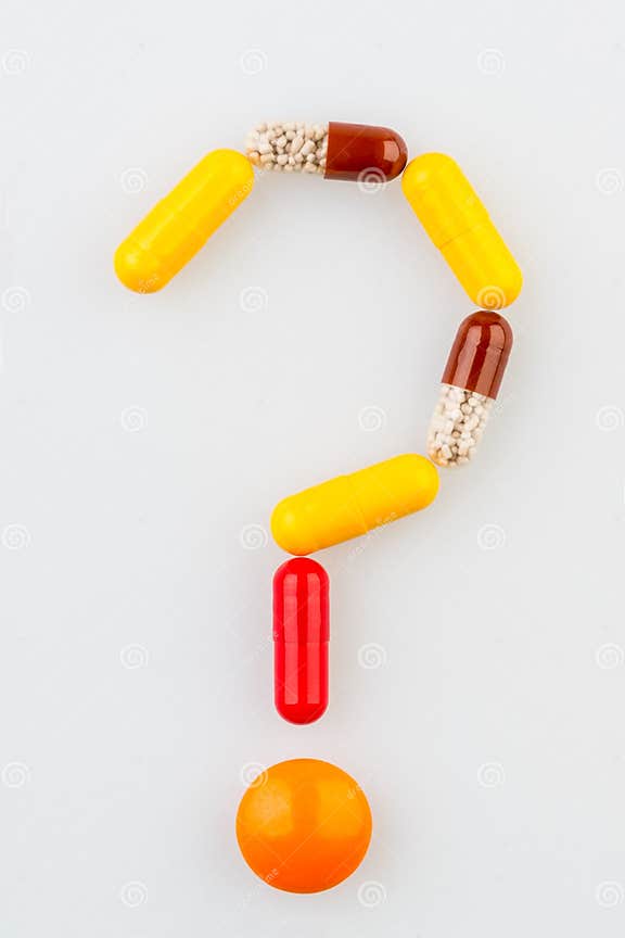 Tablets in the Form of a Question Mark on the Medical Table Stock Image ...