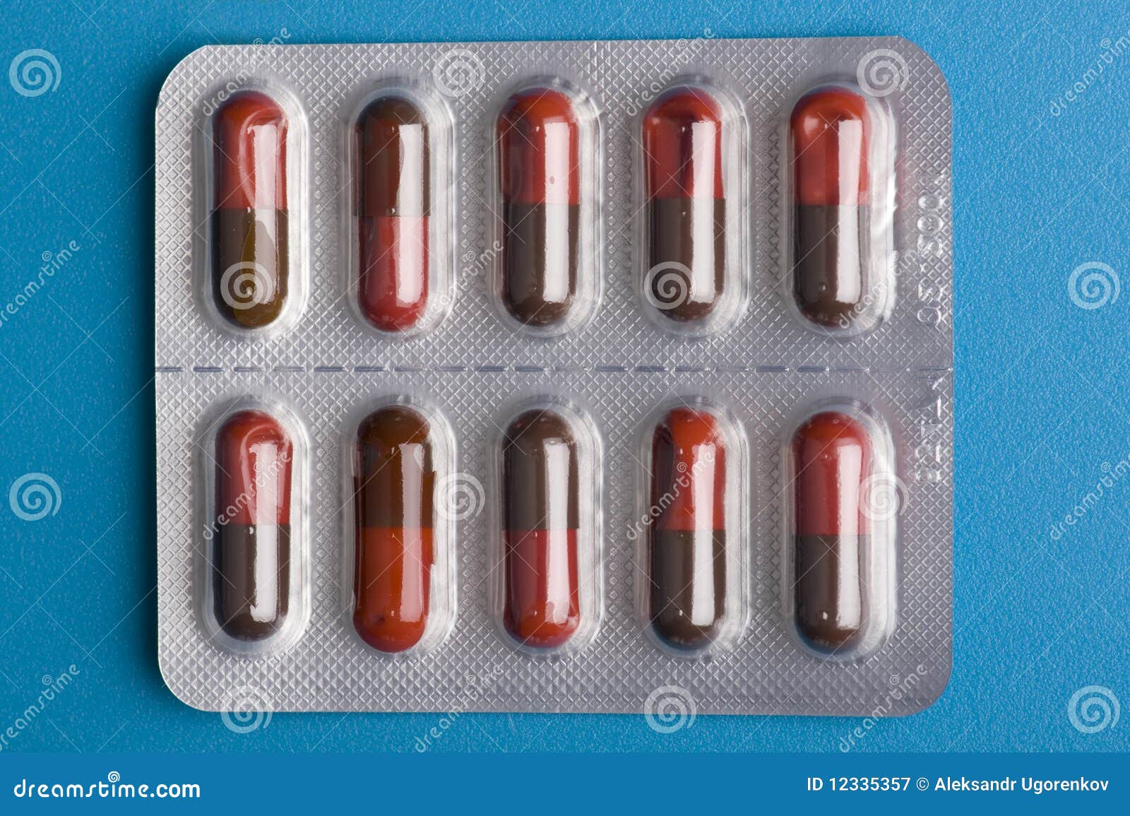 Tablets macro on blue stock image. Image of prescription - 12335357