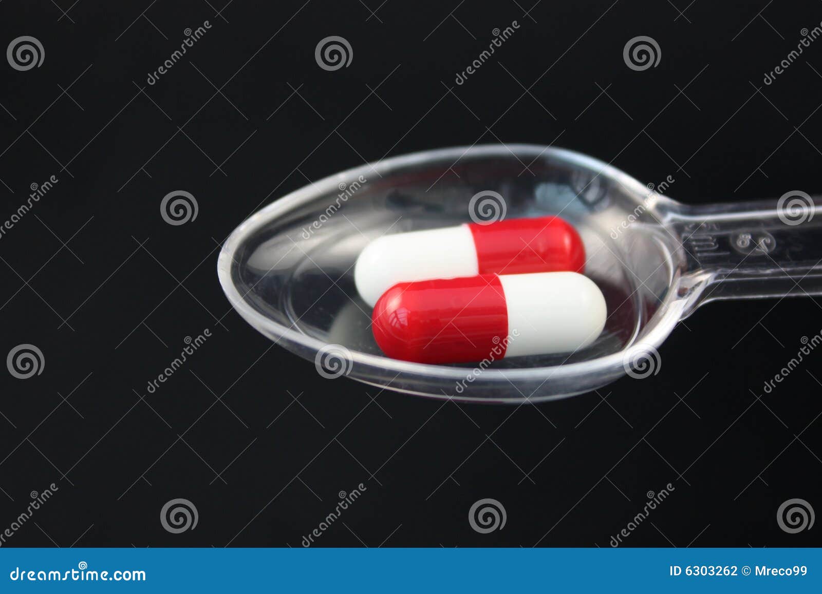 Tablets on a Medicine Spoon Stock Photo - Image of legal, medical: 6303262