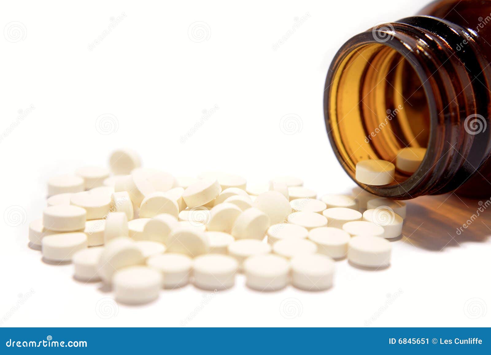 Tablets and pill bottle stock image. Image of container - 6845651