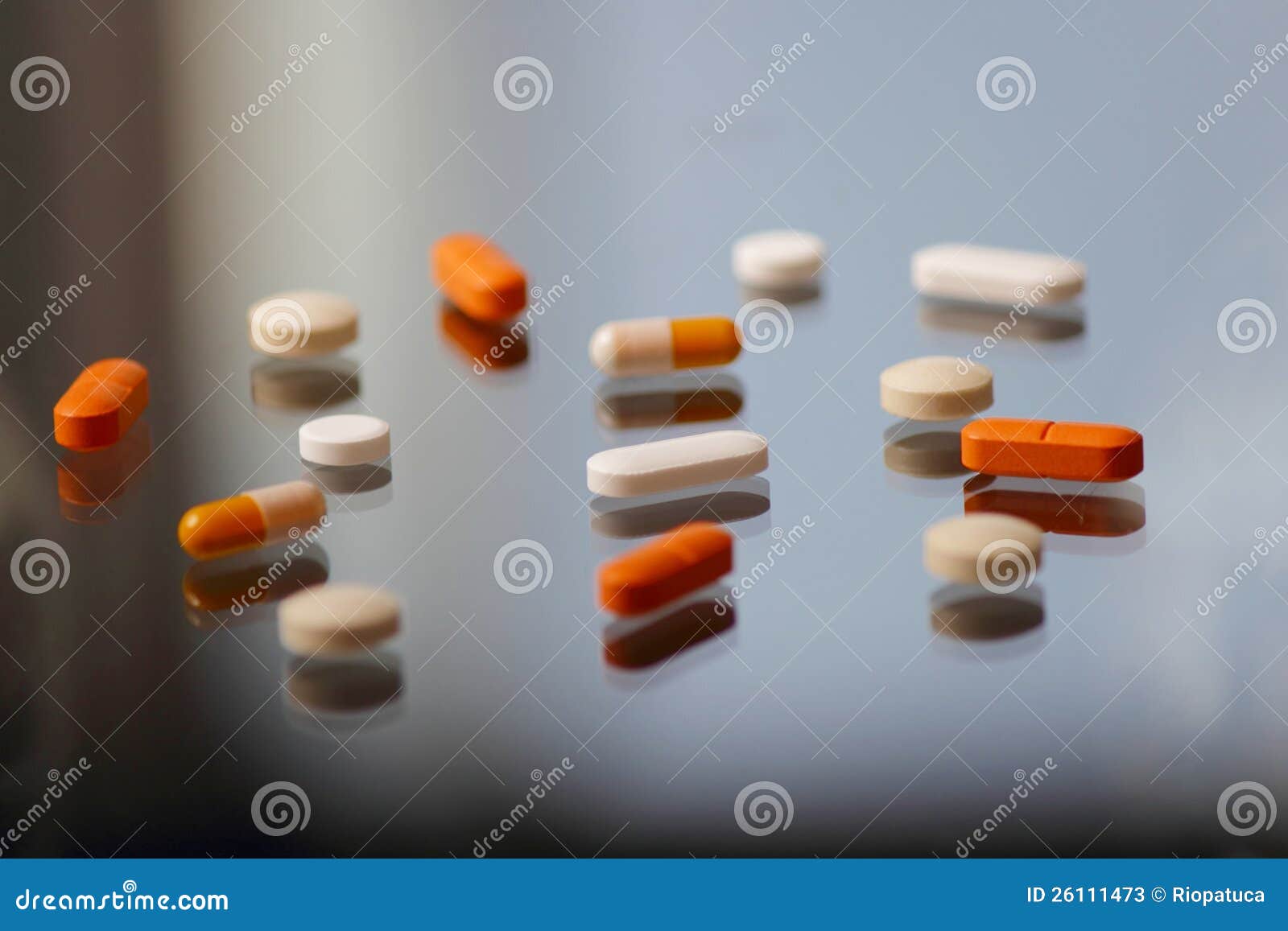 Tablets and pills on glass stock image. Image of cure - 26111473