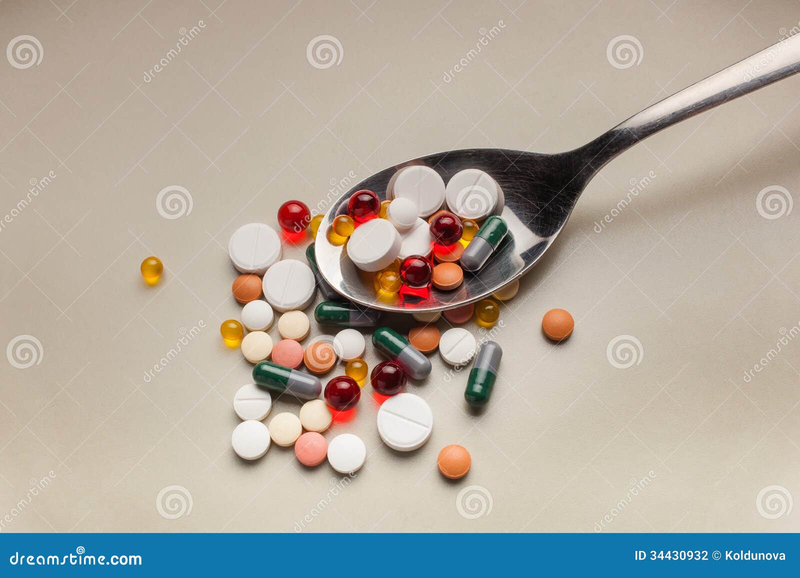 Tablets on a spoon stock photo. Image of narcotic, dose - 34430932