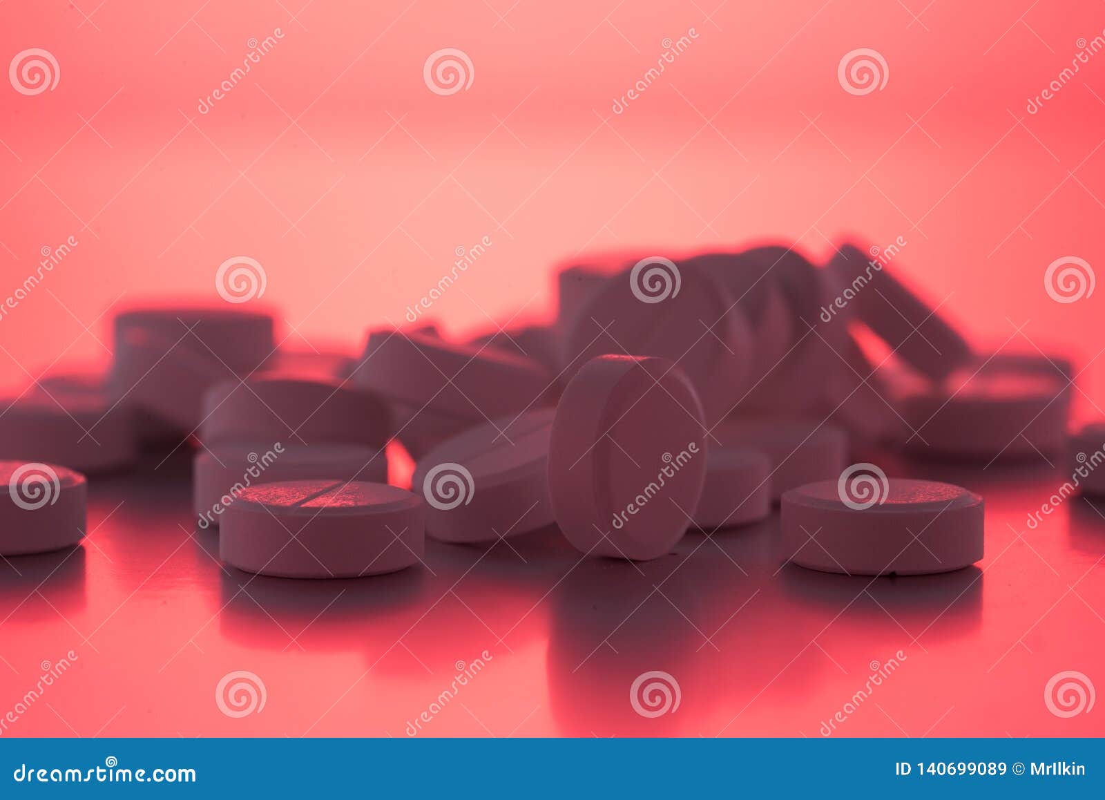 Tablets Under Red Light with the Effect of Danger. Stock Image - Image ...