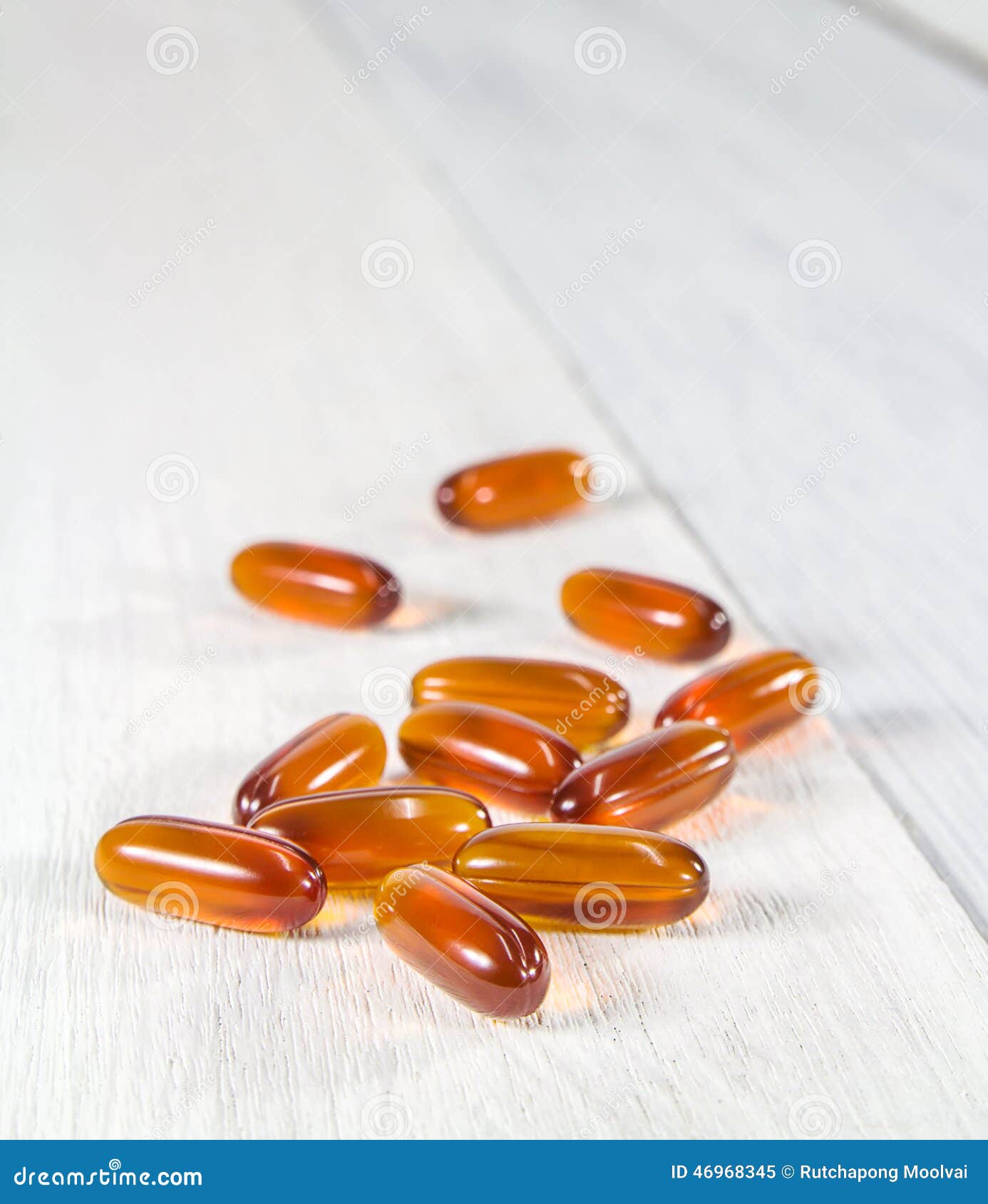 Tablets of Vitamin E. on a Wooden Texture Stock Image - Image of liver ...