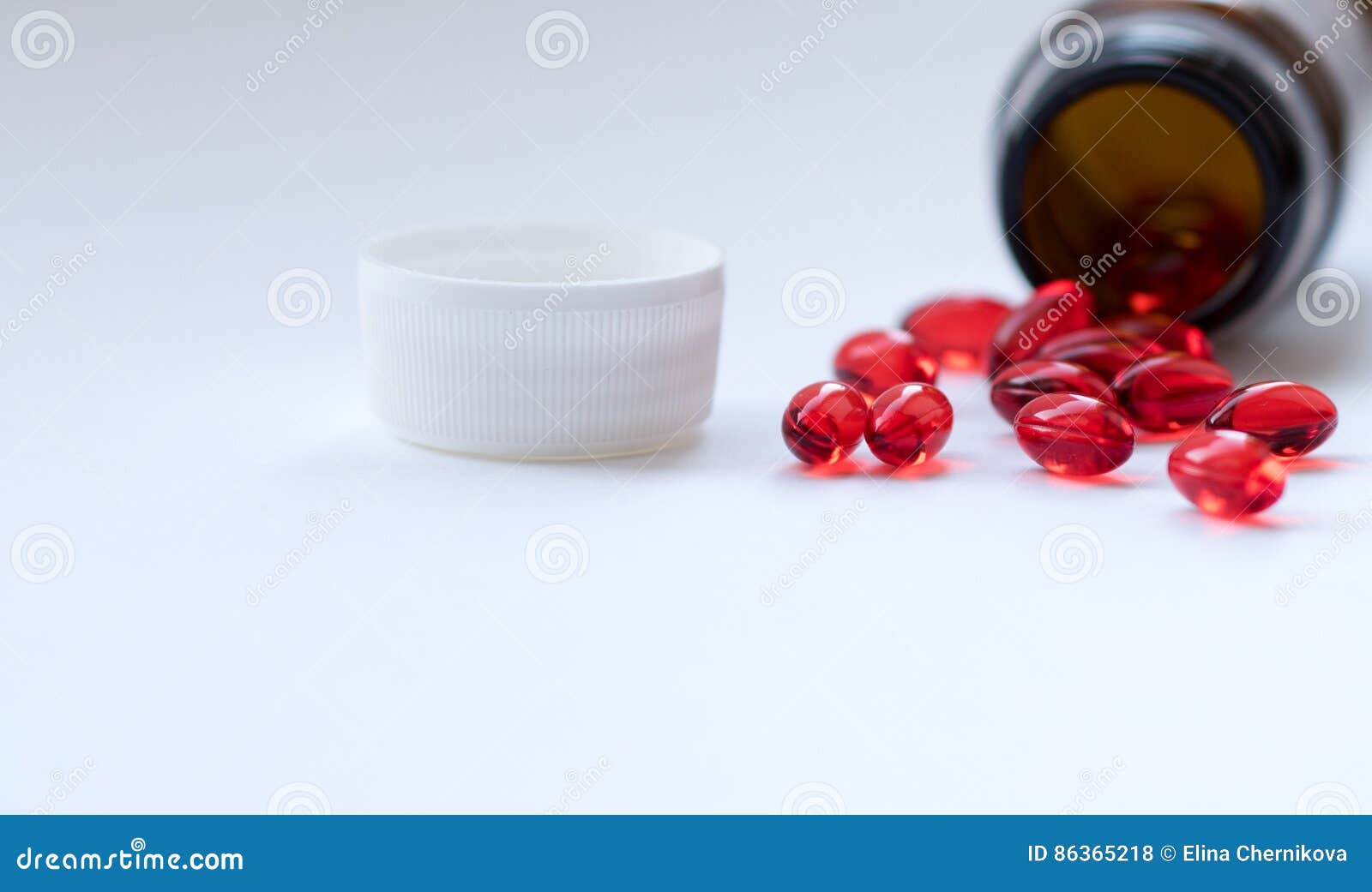 Tabs Vitamins, Omega 3, Medications Tablets and Capsules in a Beaker ...