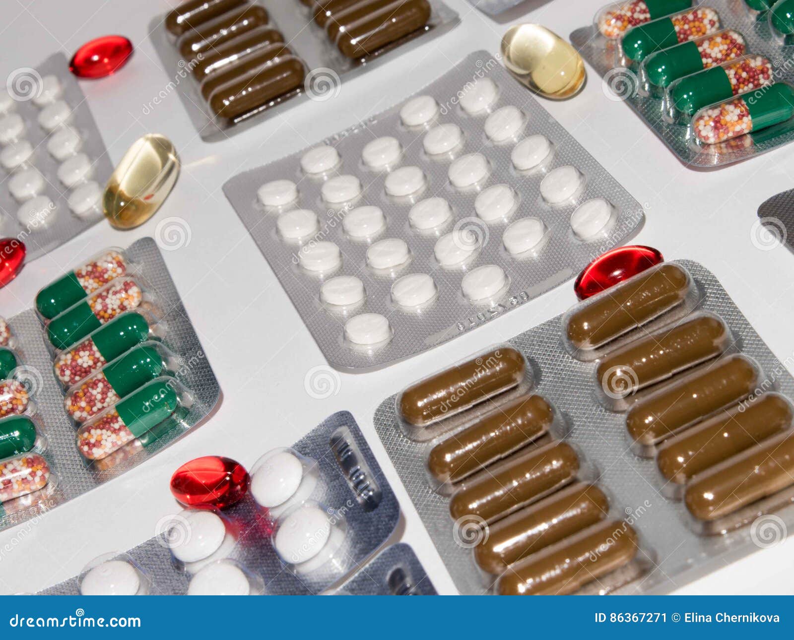 Tabs Vitamins, Omega 3, Medications Tablets and Capsules in a Beaker ...