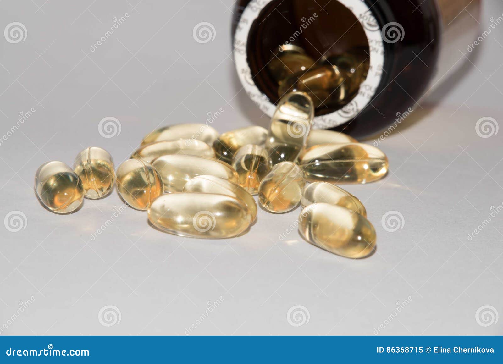 Tabs Vitamins, Omega 3, Medications Tablets and Capsules in a Beaker ...