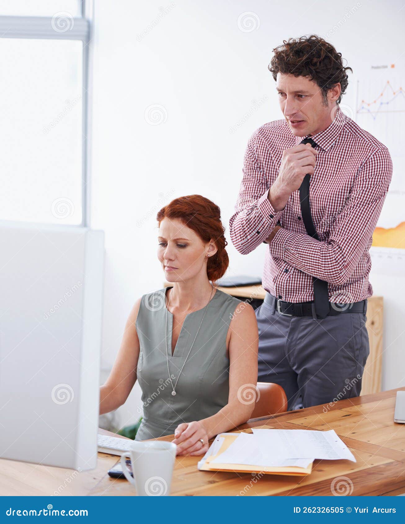 Tackling a Problem Together. Two Business Professionals Working ...