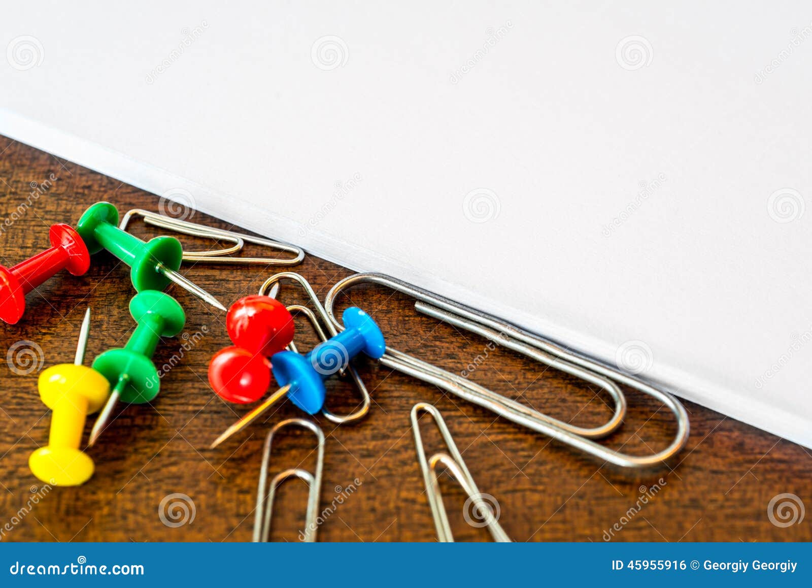 Tacks, Clips and Paper on the Table Stock Photo - Image of clip ...