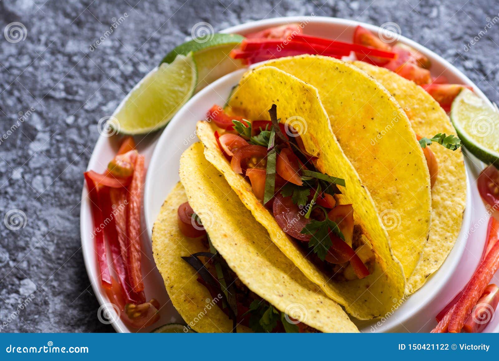 Tacos in Shells with Vegetables on Stone Background Stock Photo - Image ...