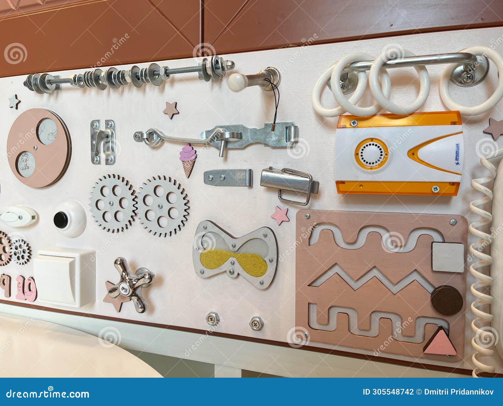 Tactile Busy Board with Buttons and Gears for Children Stock Photo ...