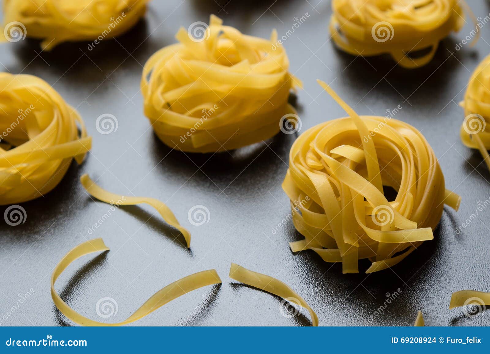 Tagliatelle on black table stock photo. Image of cuisine - 69208924
