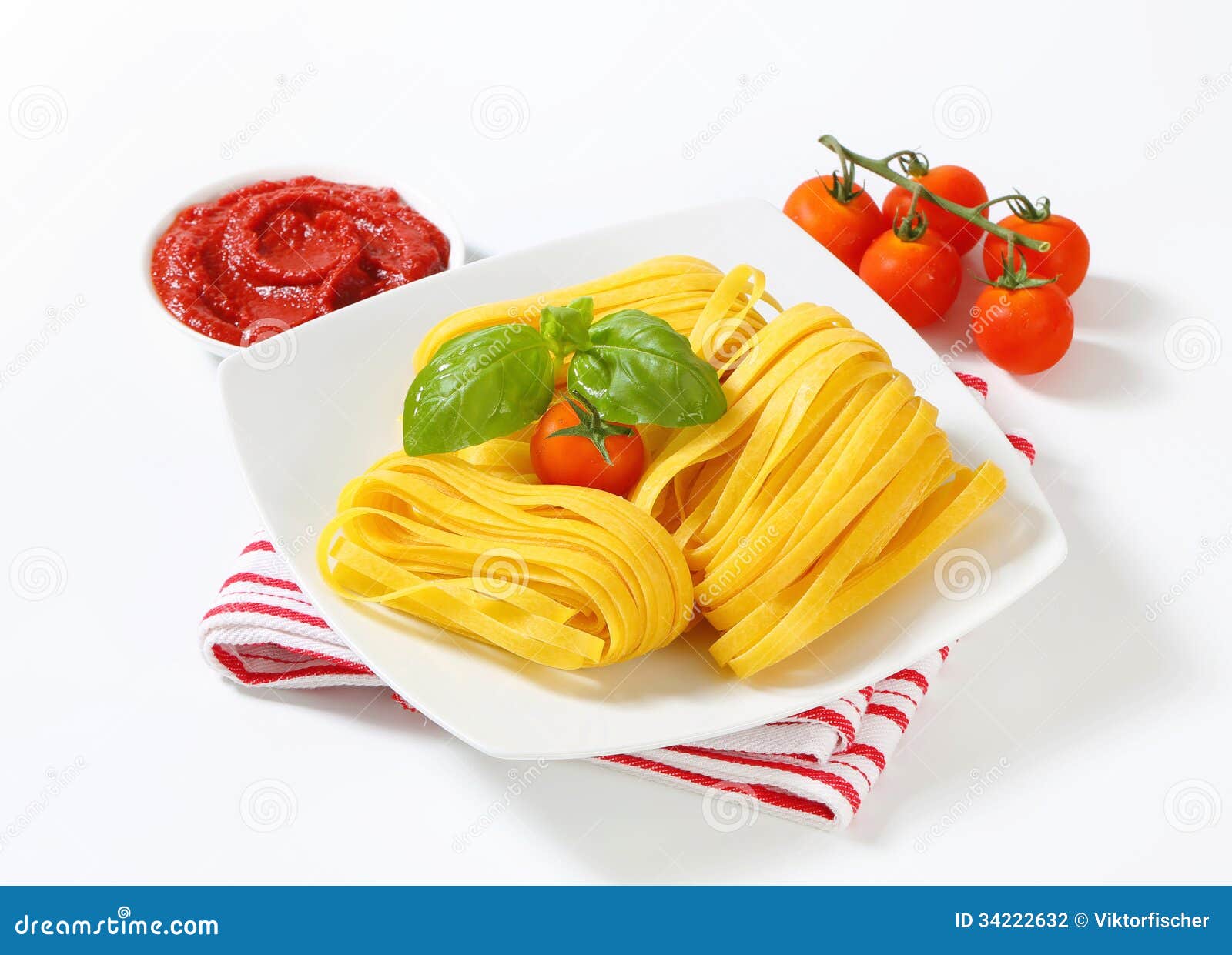 Tagliatelle Pasta and Tomato Paste Stock Photo - Image of long, passata ...