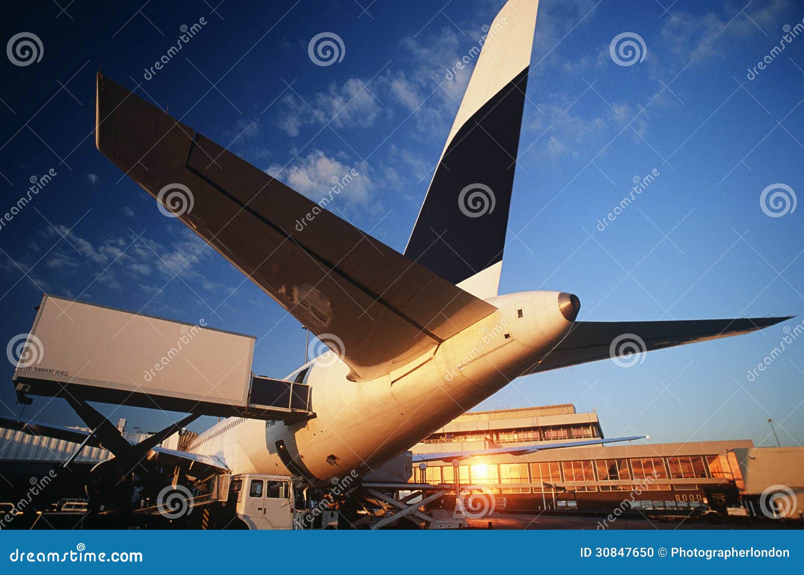 Tail Fin of Airplane at Airport Sunset Stock Photo - Image of view ...