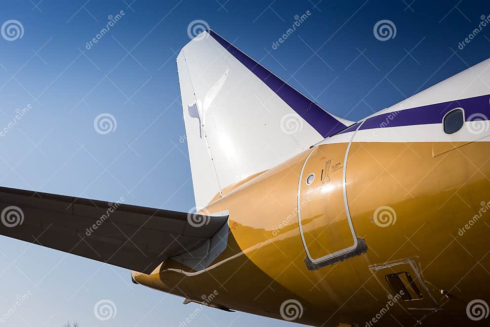 Tail Section Aircraft. Rear Side of a Large Passenger Plane Stock Photo ...