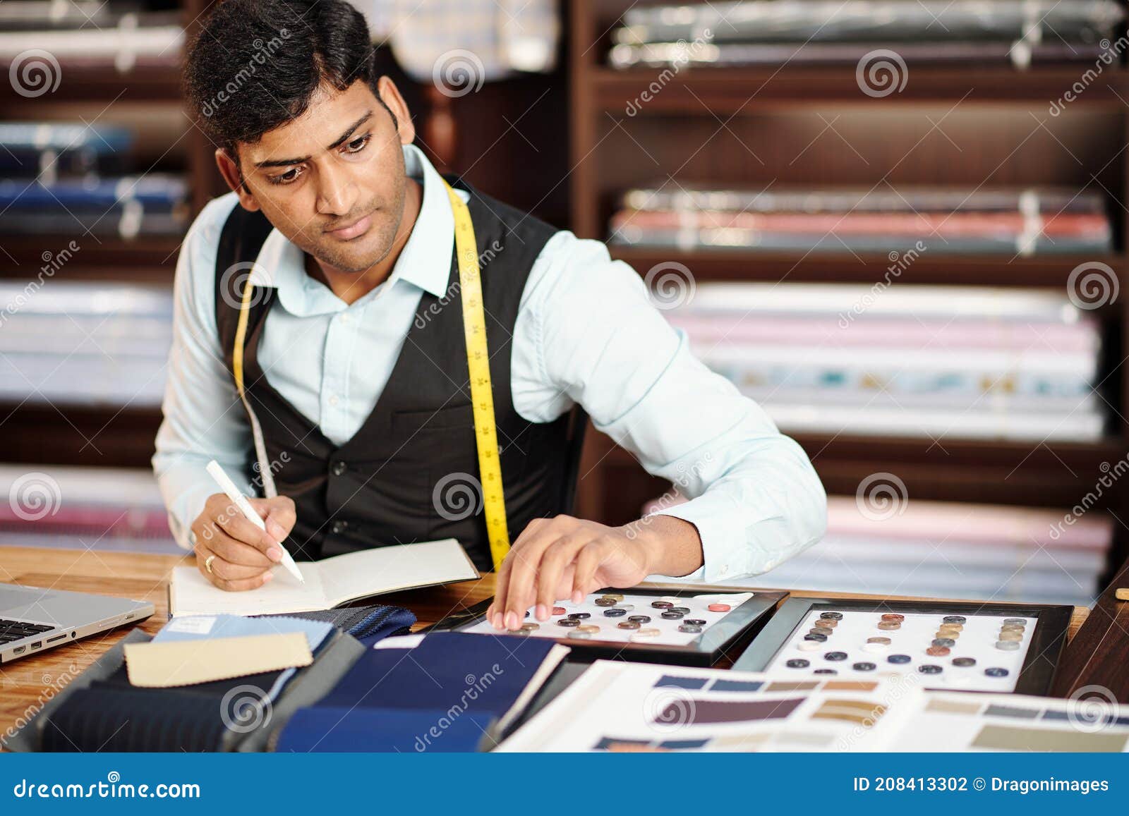 Tailor choosing catalog stock photo. Image of business - 208413302