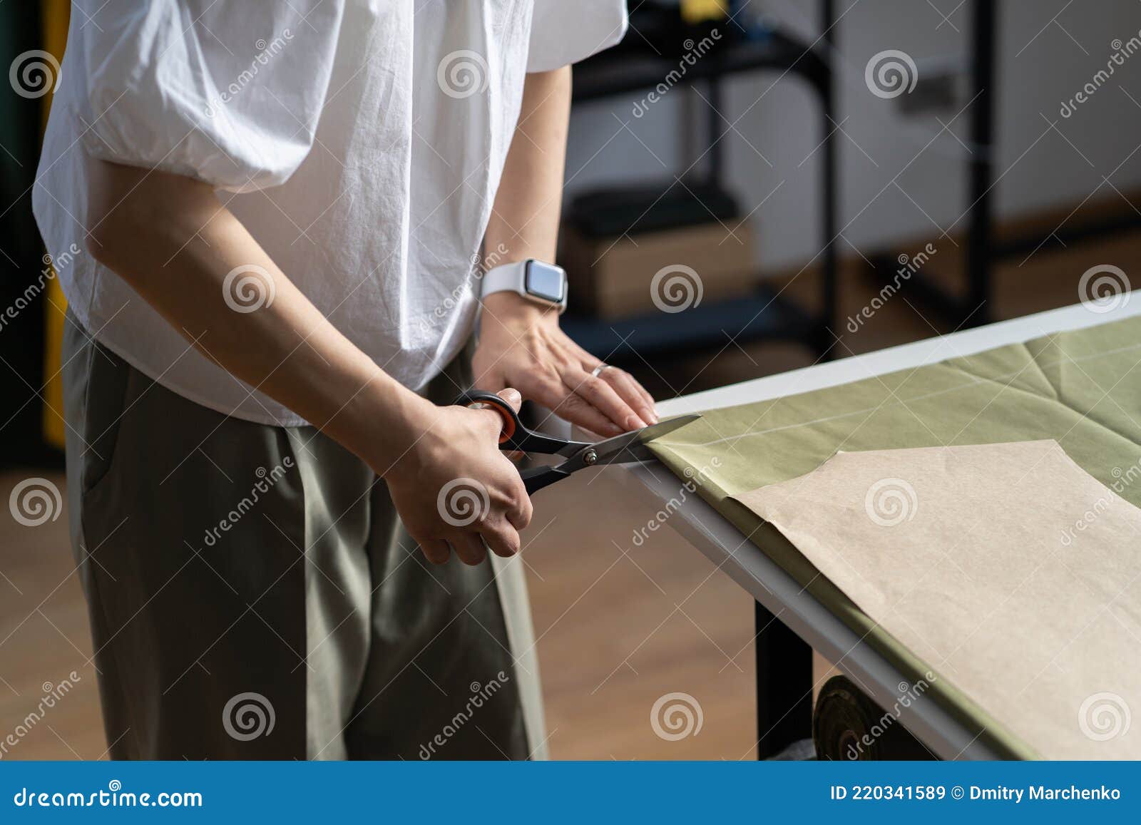 Tailor Cut Fabric Pattern for Garment. Female Sewer Hand Hold Scissors ...