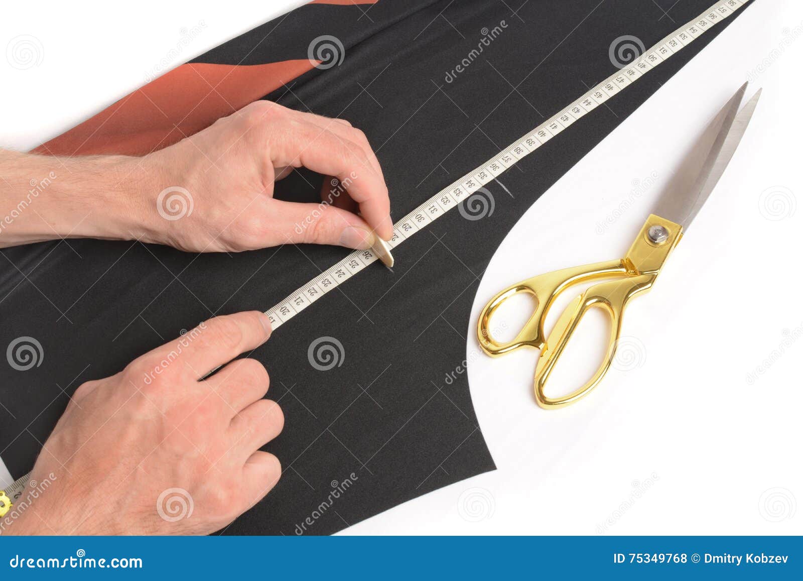 Tailor cuts piece of cloth stock photo. Image of fashion - 75349768