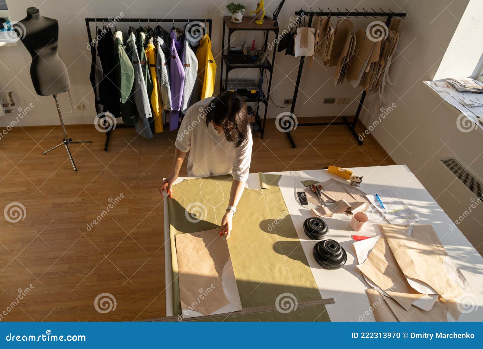 Tailor Cutting Textile from Paper Pattern. Fashion Designer Draft on ...