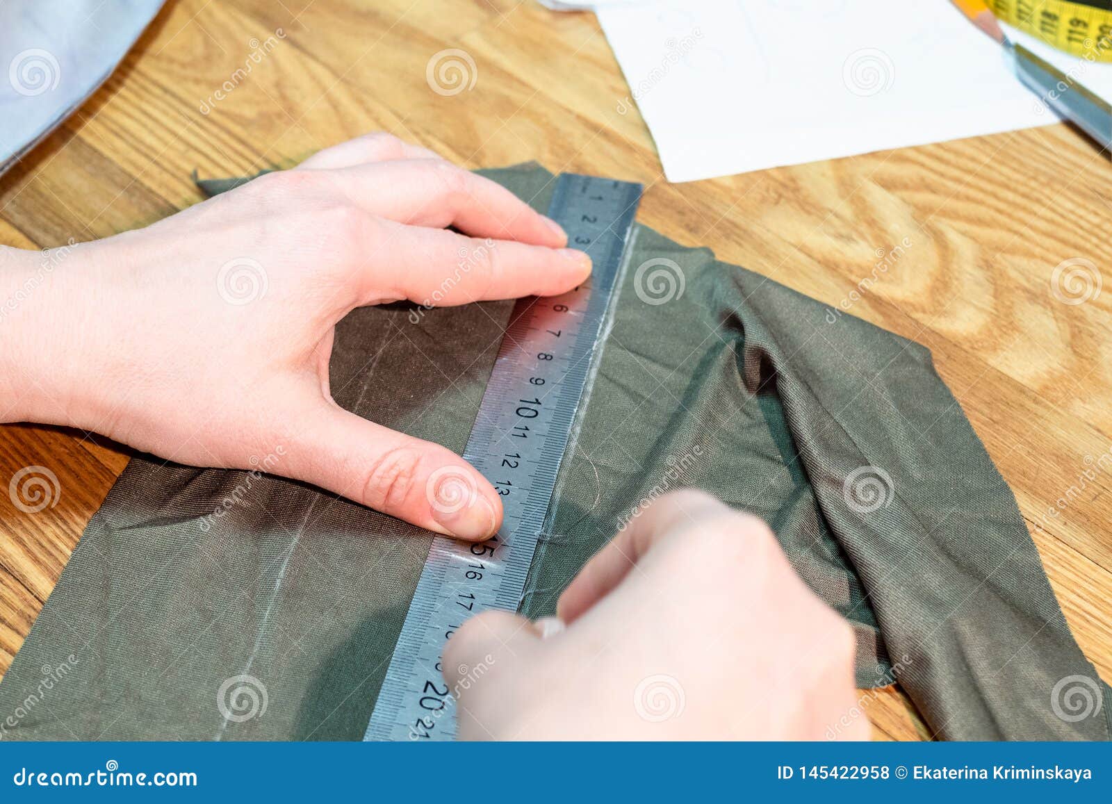 Tailor Draws a Pattern on Cloth with Ruler Stock Photo - Image of close ...