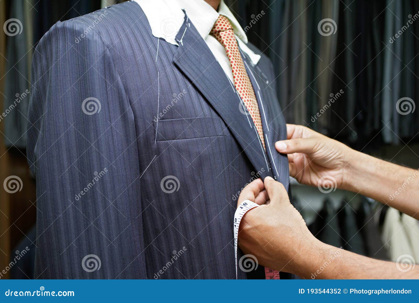 Tailor Fitting Man in Suit stock photo. Image of lifestyle - 193544352