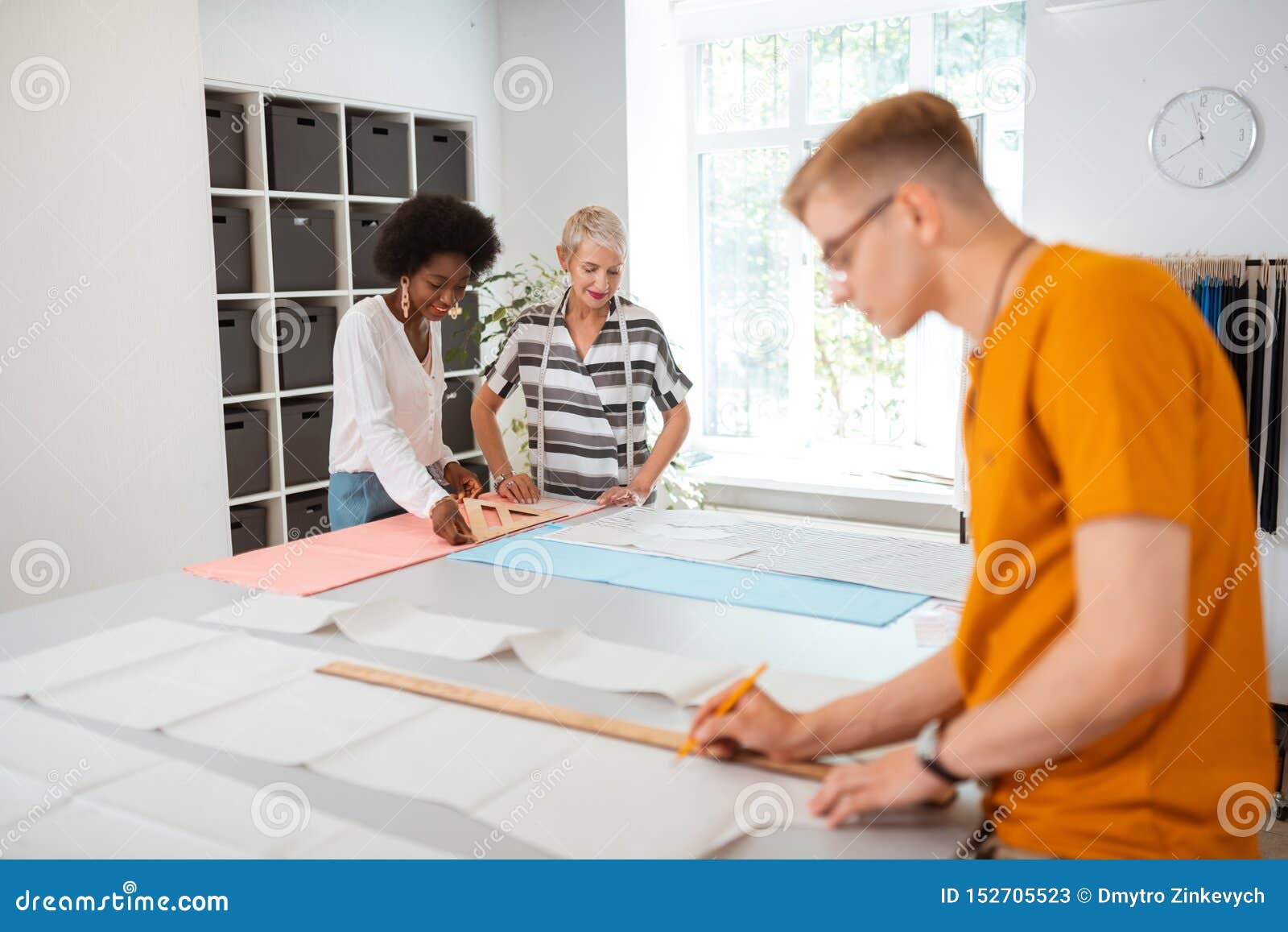 Tailor Making a Paper Pattern in a Studio Stock Image - Image of busy ...