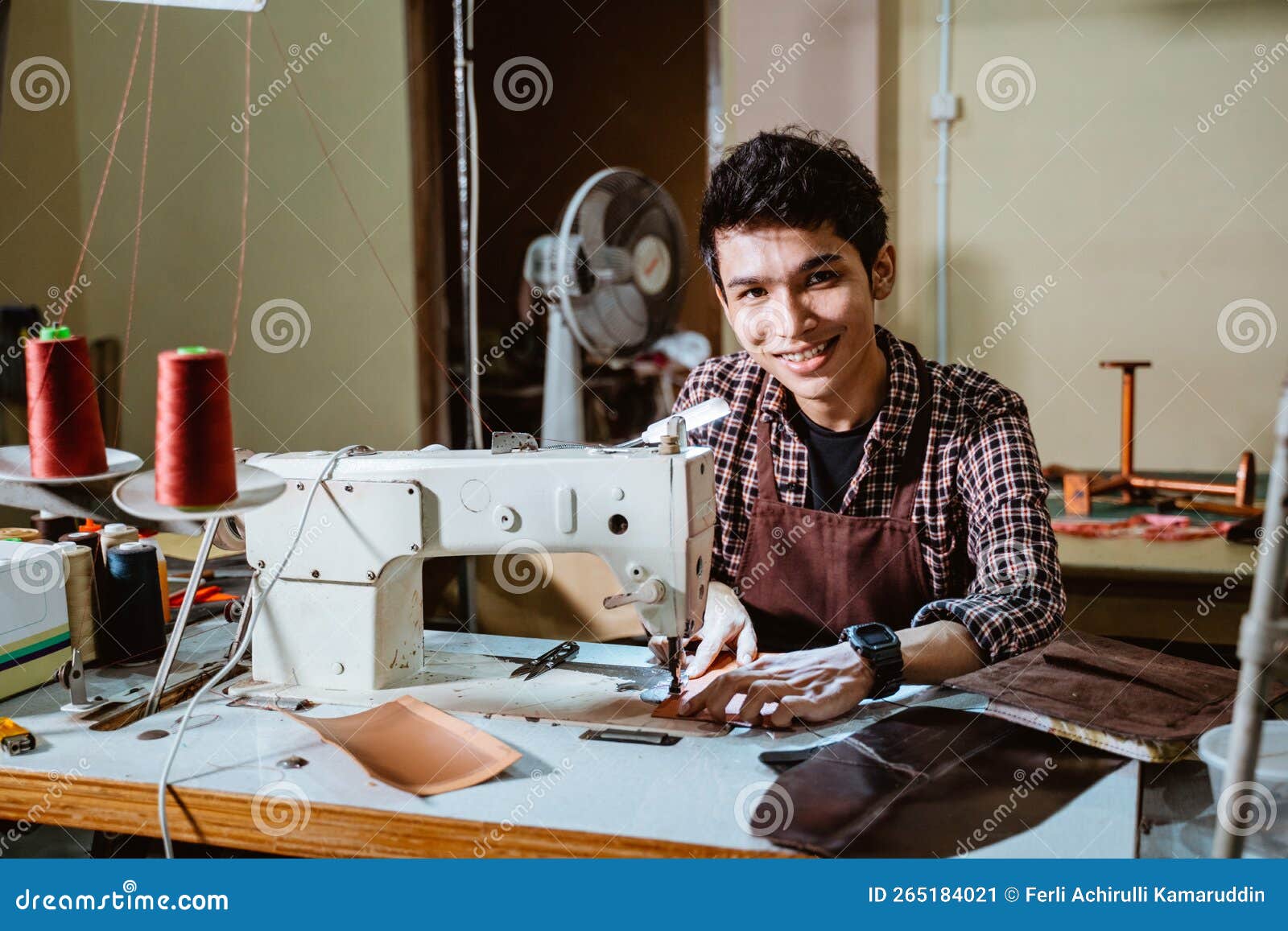 Tailor Man Smiling while Using a Sewing Machine Stock Image - Image of ...