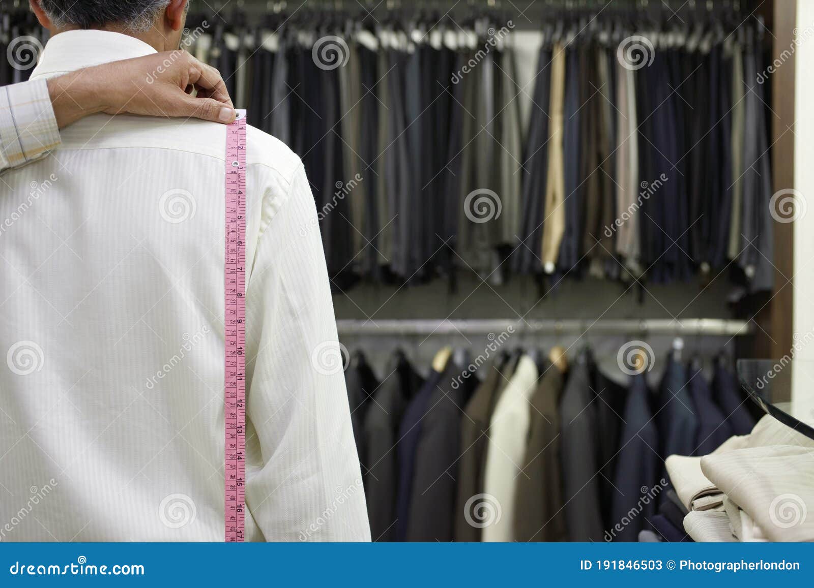 Tailor Measuring Business Man with Tape Measure Mid Section Back View ...