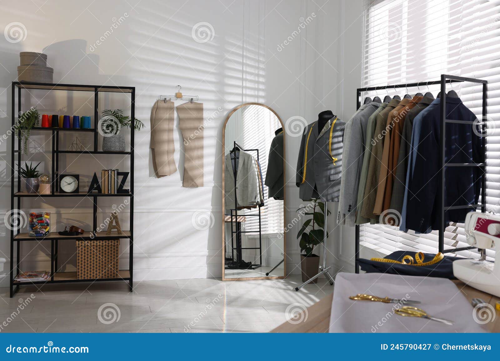 Tailor Shop Interior with Mannequin and Male Suits on Rack Stock Image ...