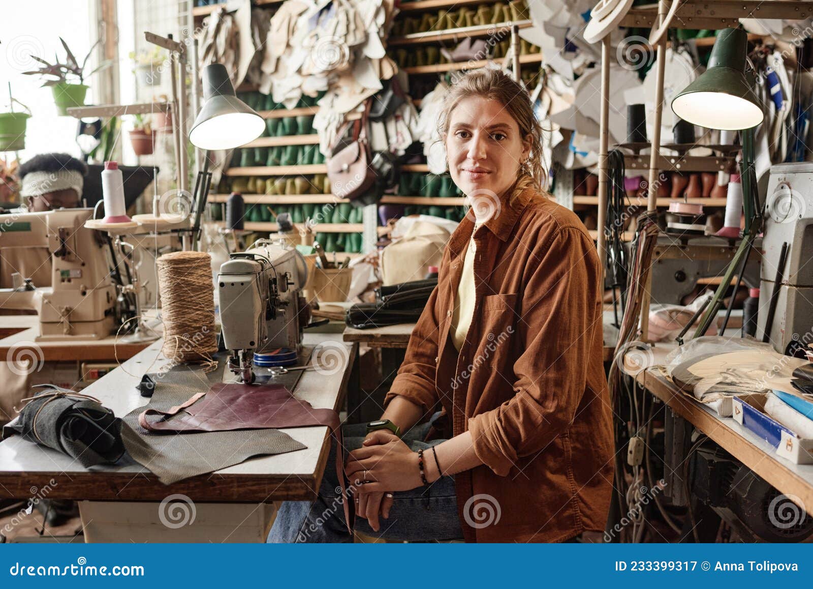 Tailor Sitting at Her Workplace in the Factory Stock Image - Image of ...