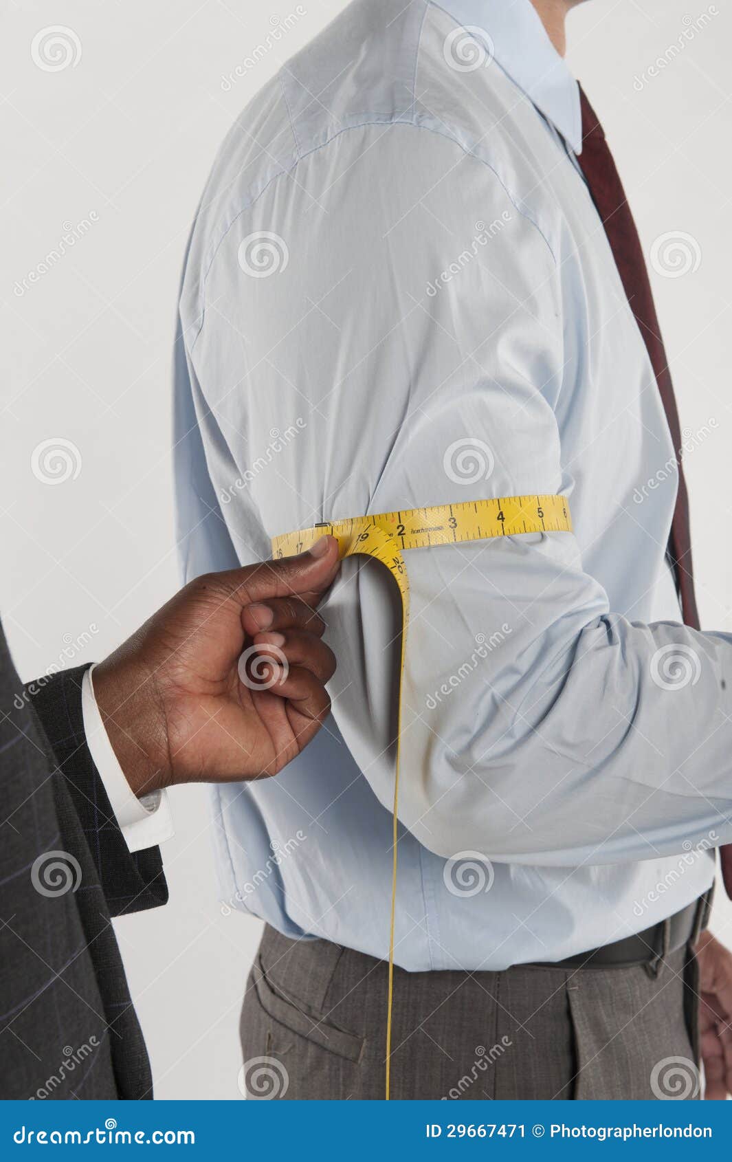 Tailor Taking the Measurement of a Customer Stock Image - Image of ...