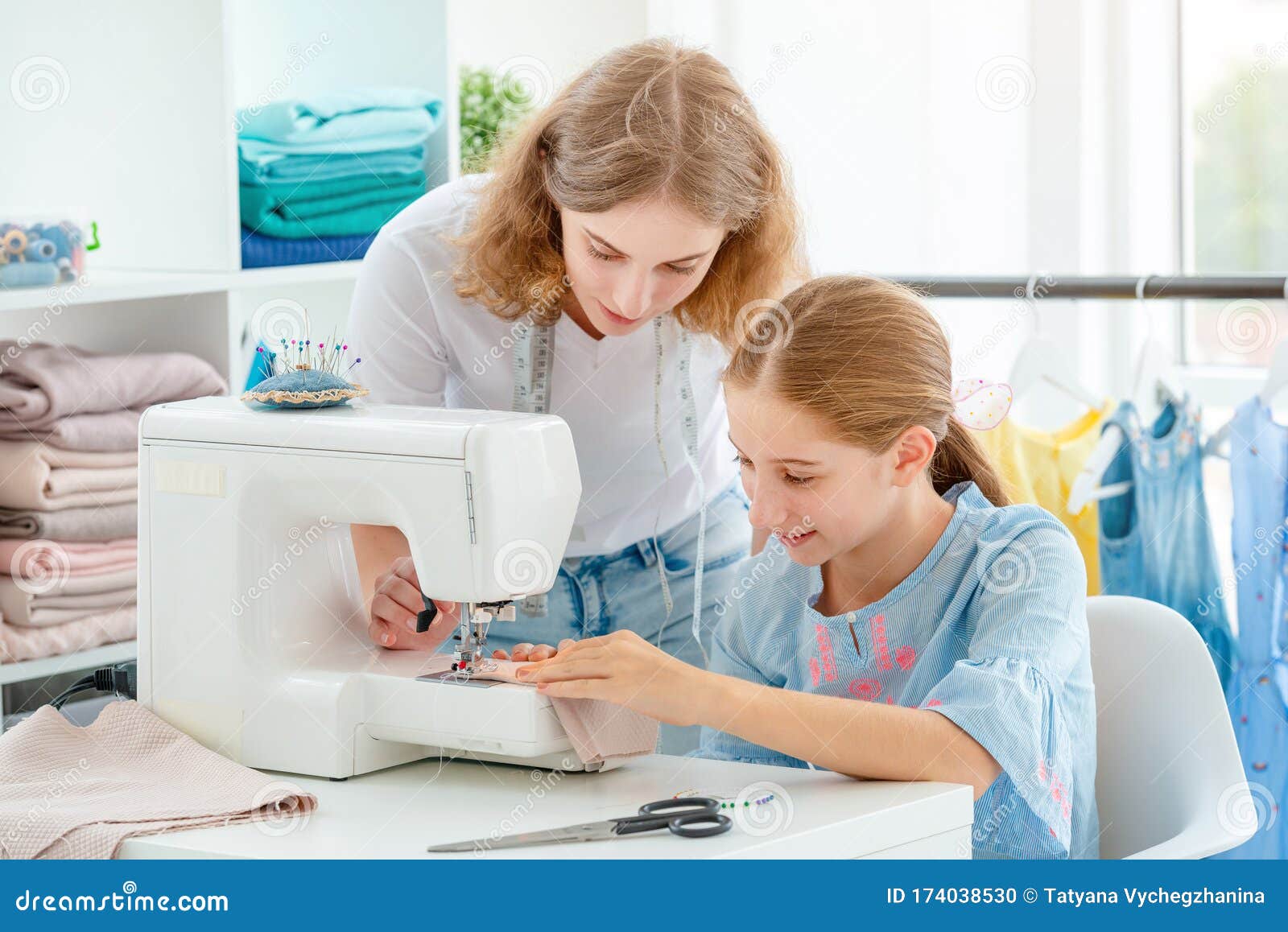 Tailor is teaching student stock photo. Image of cloth - 174038530