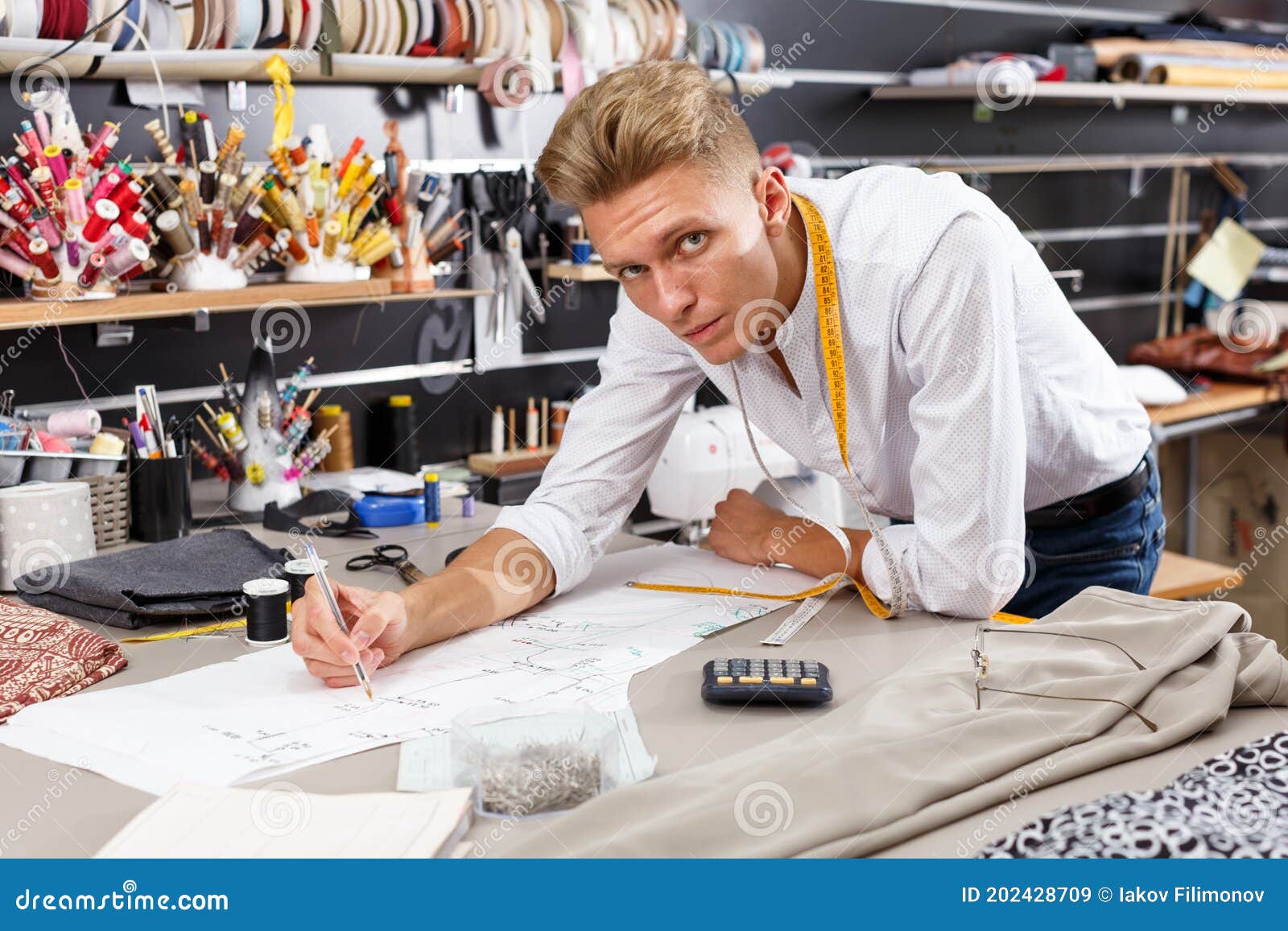 Tailor Using Tape Measure for Creating Pattern Stock Image - Image of ...