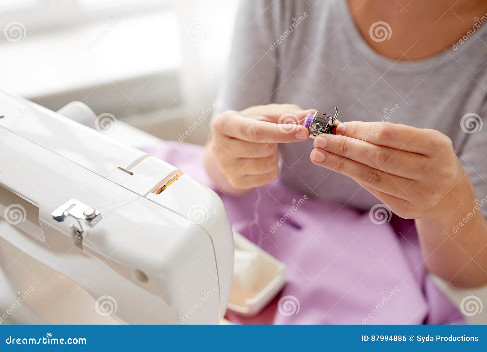Tailor Woman with Spool of Sewing Machine Stock Photo - Image of ...