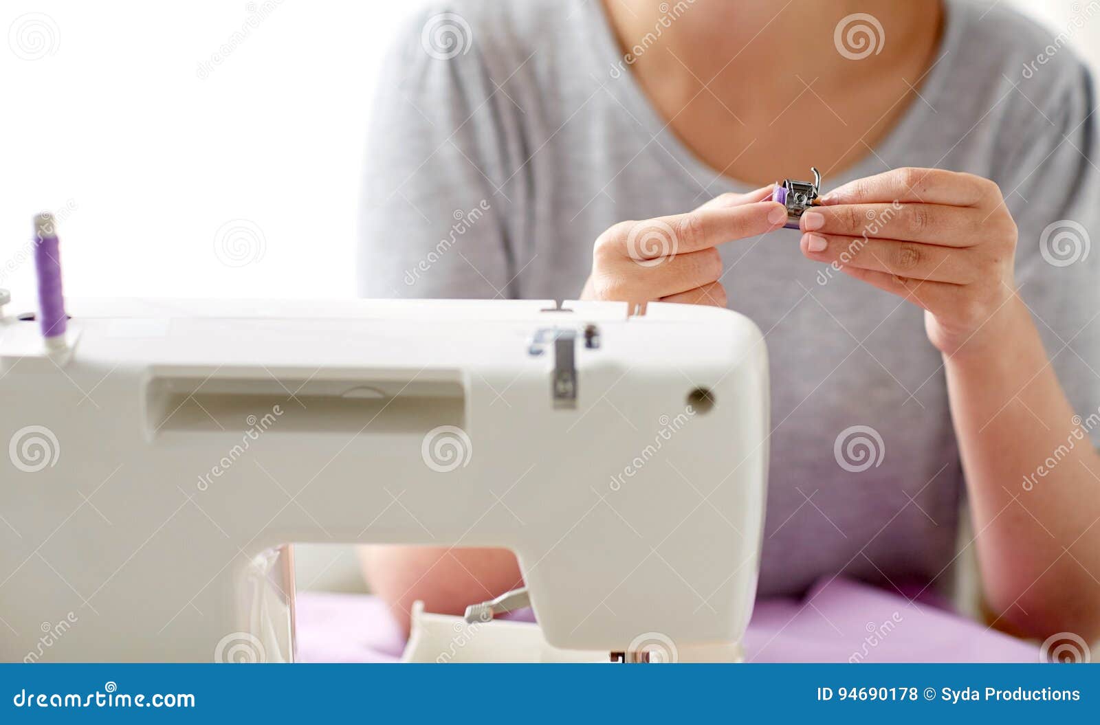 Tailor Woman with Spool of Sewing Machine Stock Photo - Image of ...