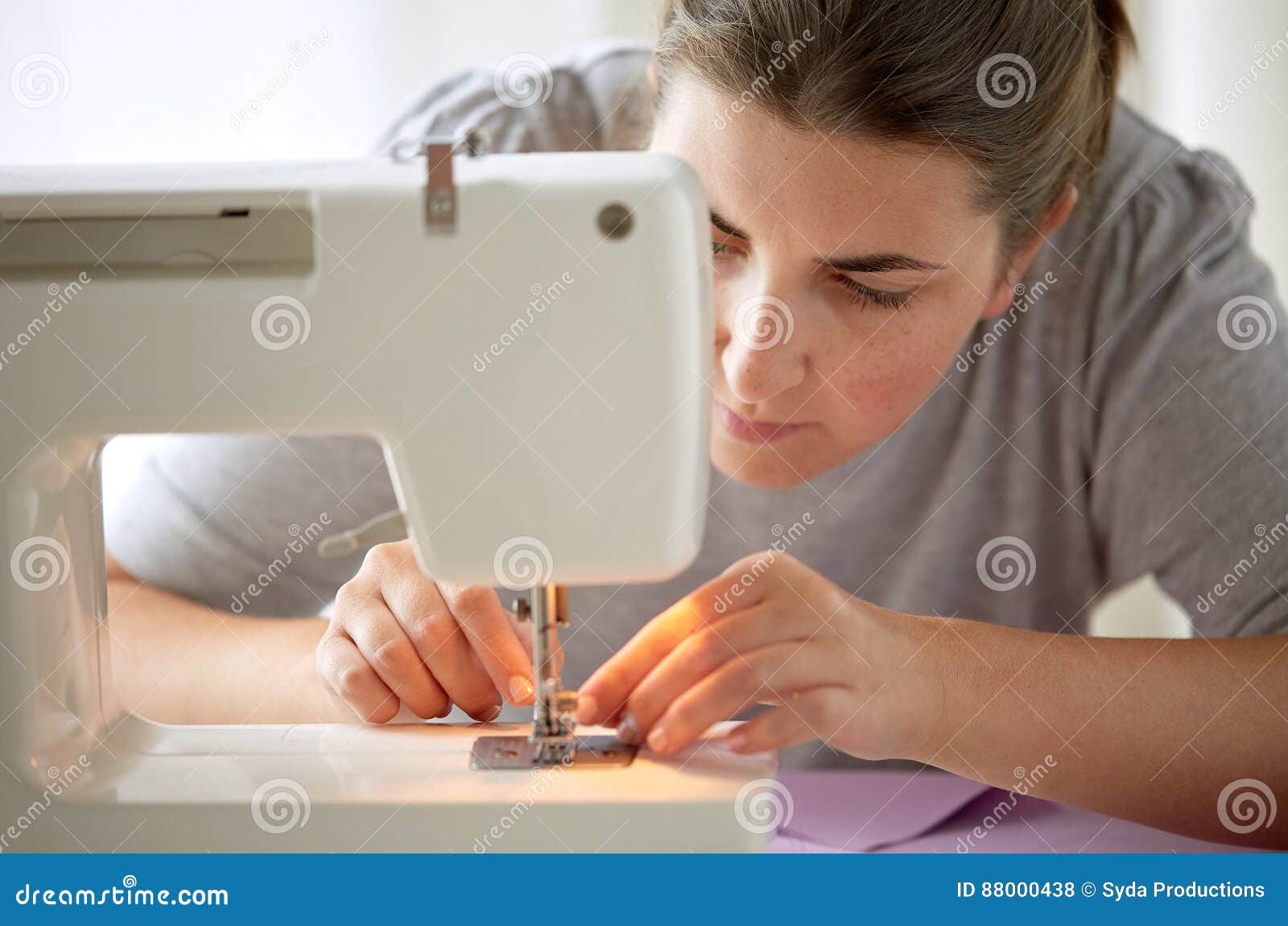 Tailor Woman Threading Needle of Sewing Machine Stock Photo - Image of ...