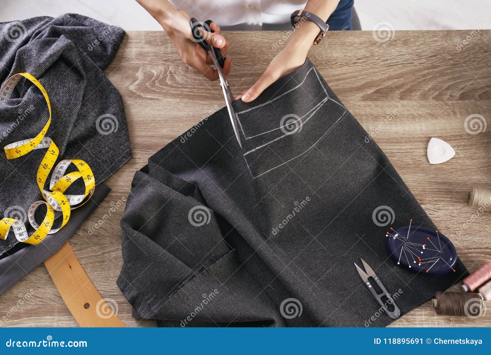 Tailor Working with Cloth at Table in Atelier Stock Image - Image of ...