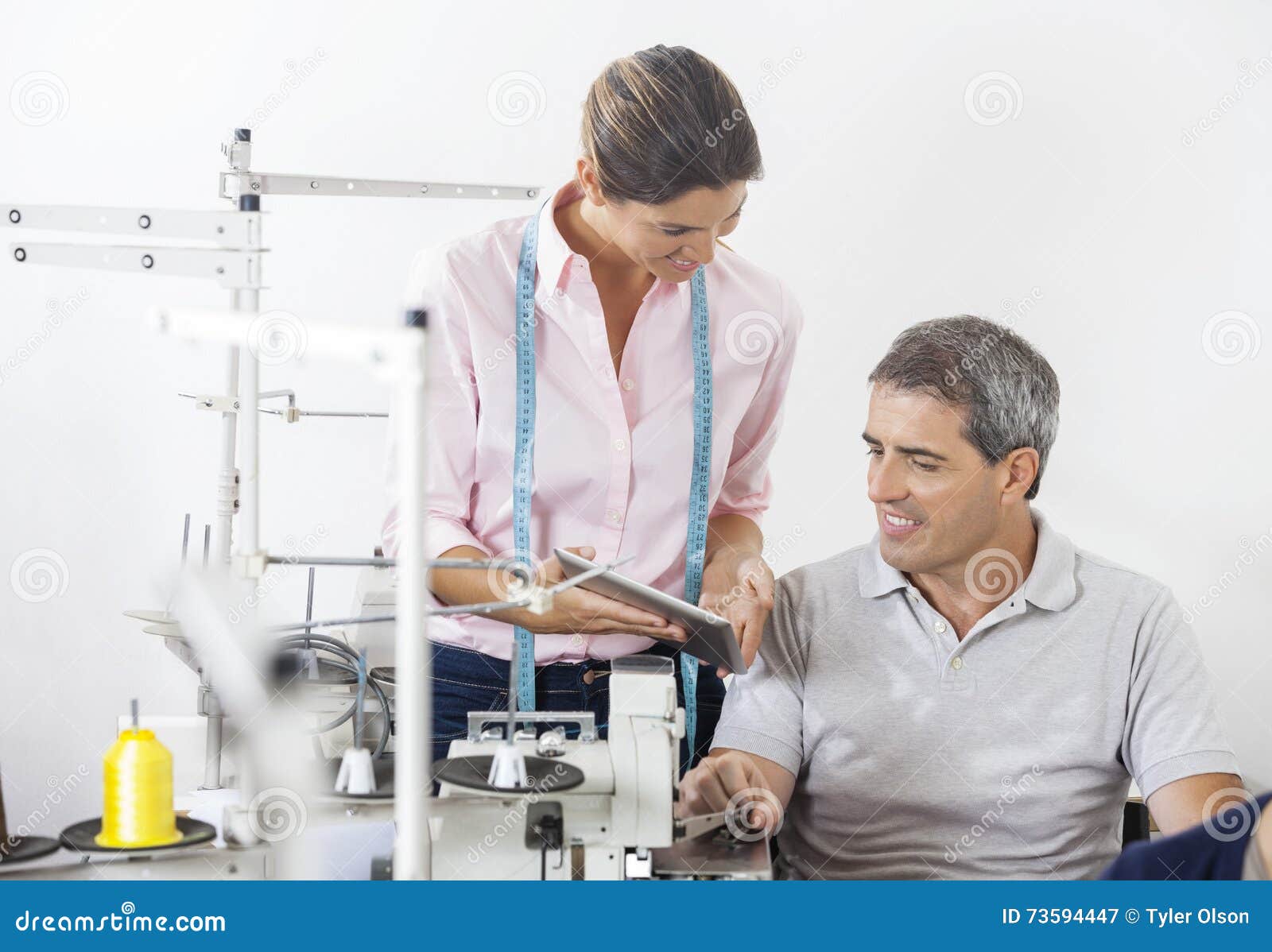 Tailors Using Digital Tablet in Factory Stock Image - Image of ...