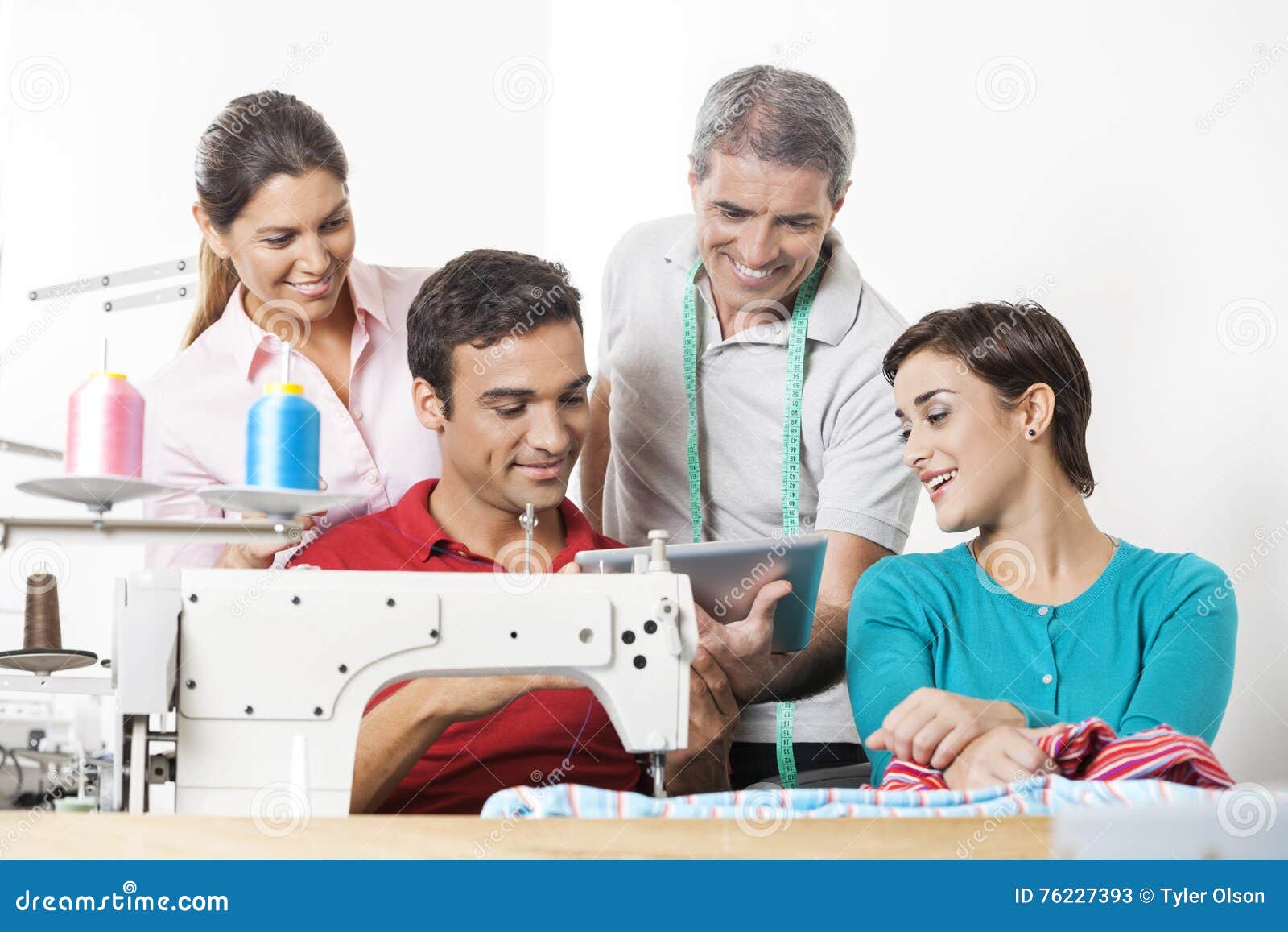 Tailors Using Tablet Computer in Sewing Factory Stock Image - Image of ...