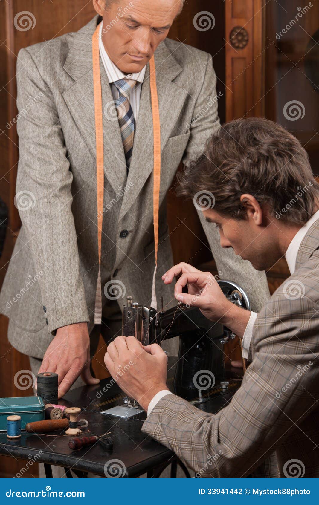 Tailors at work. stock photo. Image of sewing, human - 33941442
