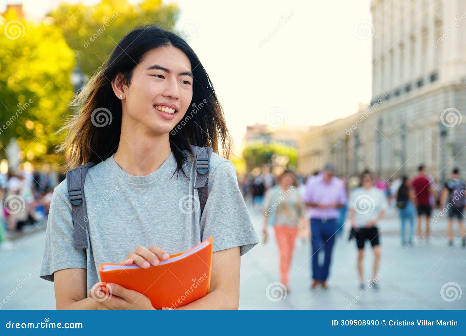 Taiwanese Male Student Smiling with a Folder and Backpack at University ...
