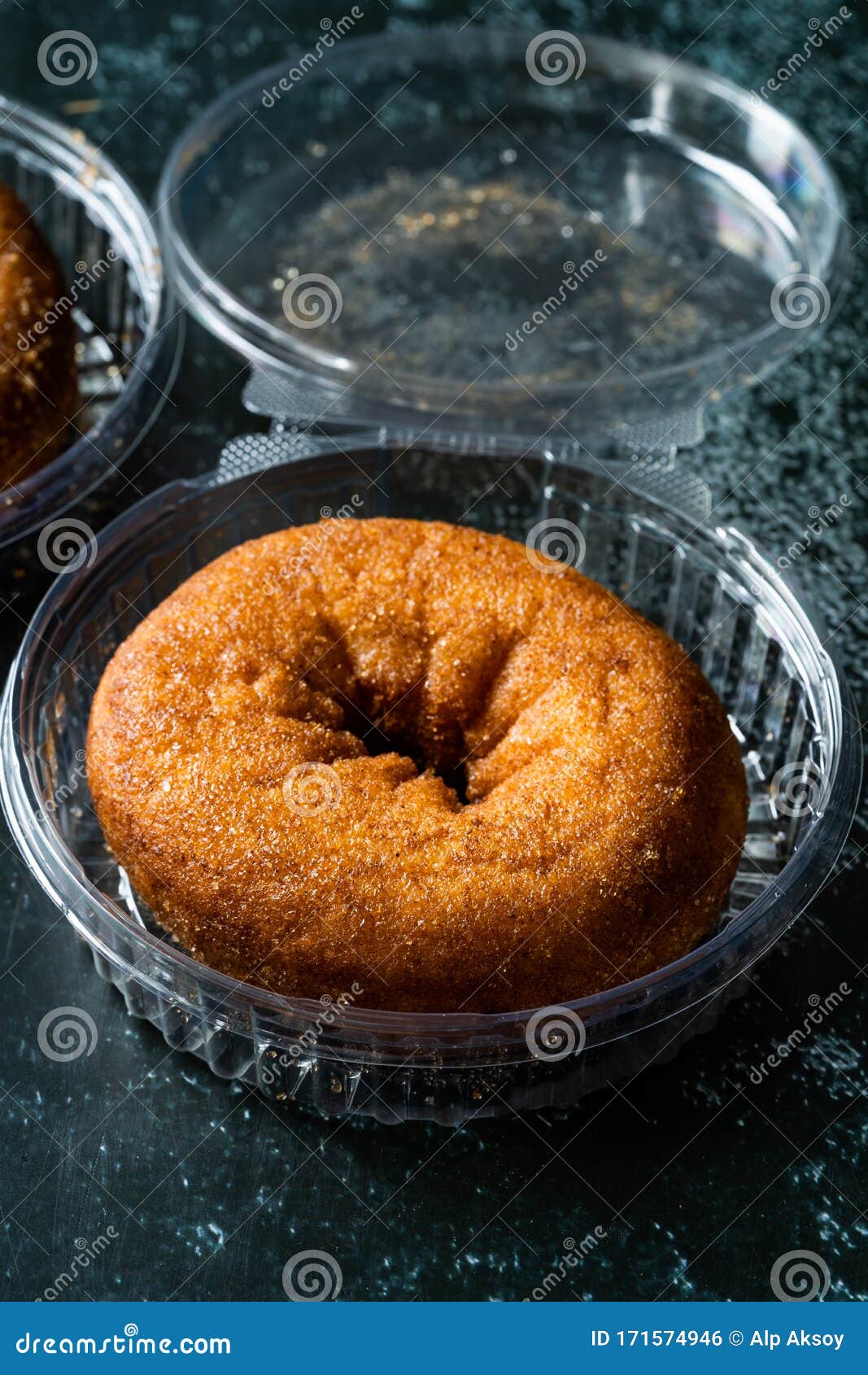 Take Away Donuts with Cinnamon in Plastic Box Package / Container Stock ...