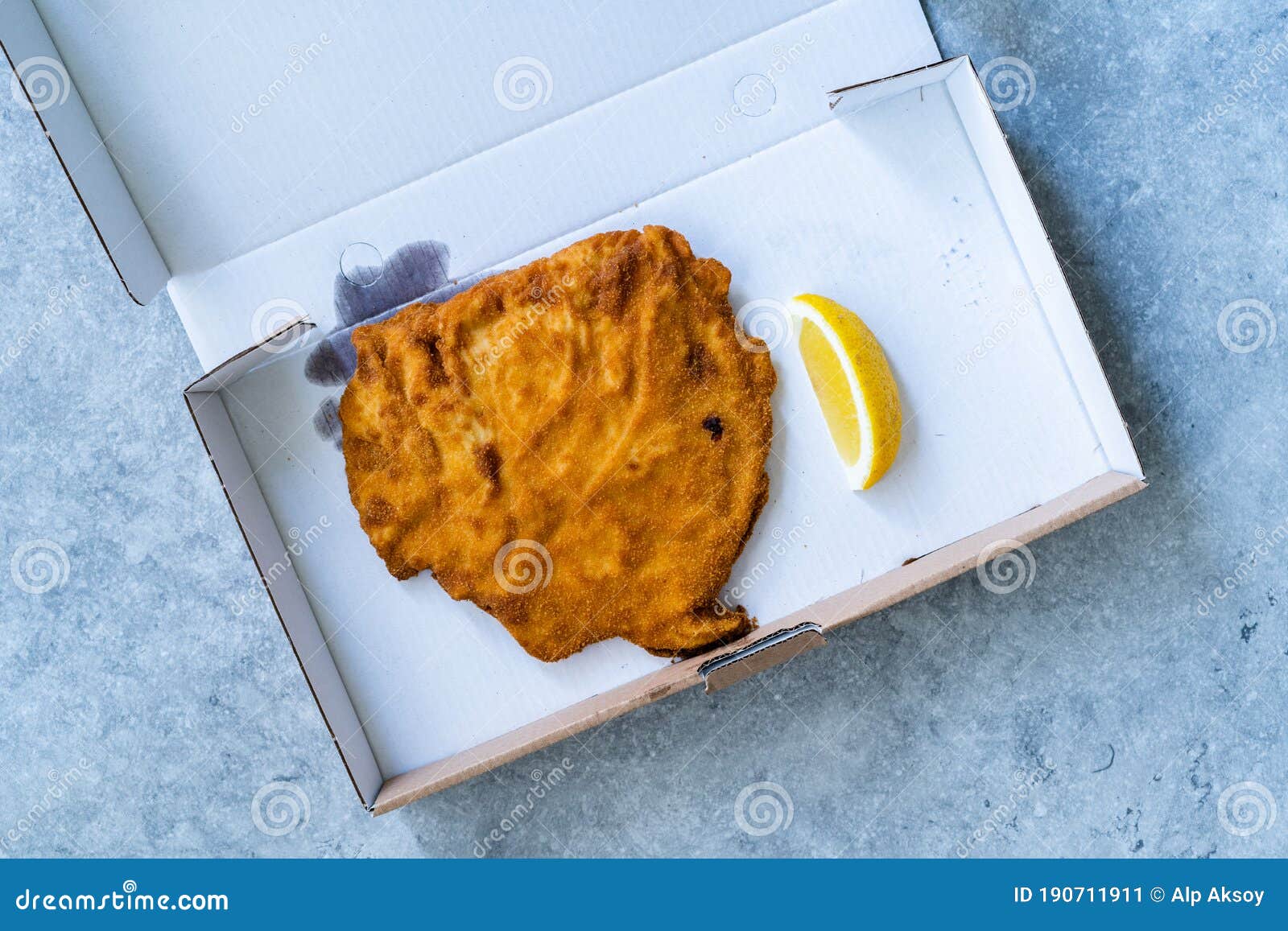 Take Away Schnitzel Cordon Bleu with Lemon in Plastic Box Container ...