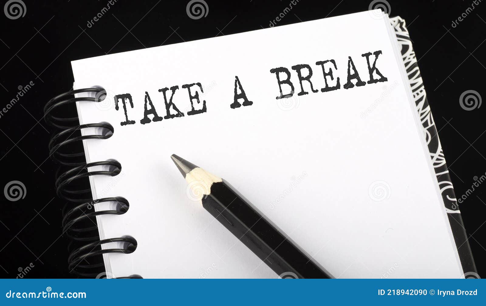 TAKE a BREAK Written Text in Small Notebook on a Black Background Stock ...