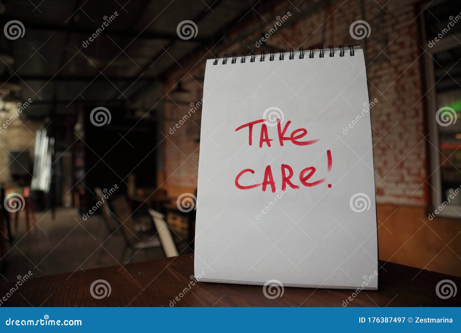 Take Care Text Written on a Paper on the Street Cafe Table Stock Image ...