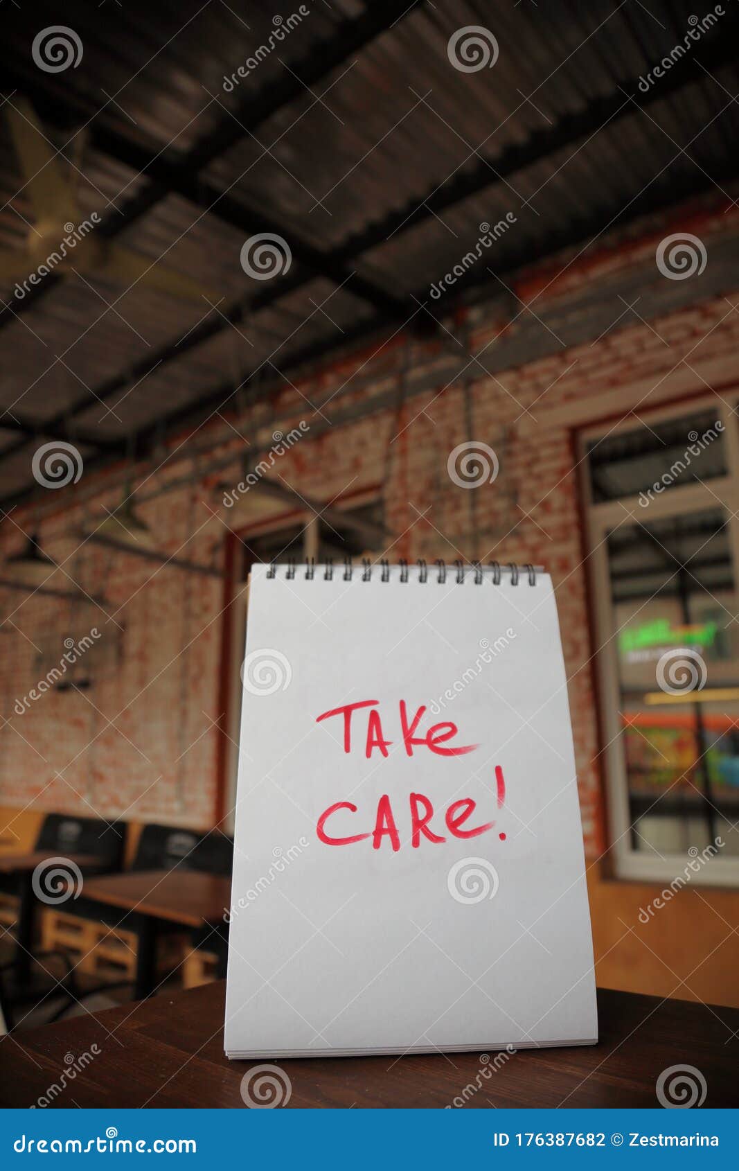 Take Care Text Written on a Paper on the Street Cafe Table Stock Photo ...