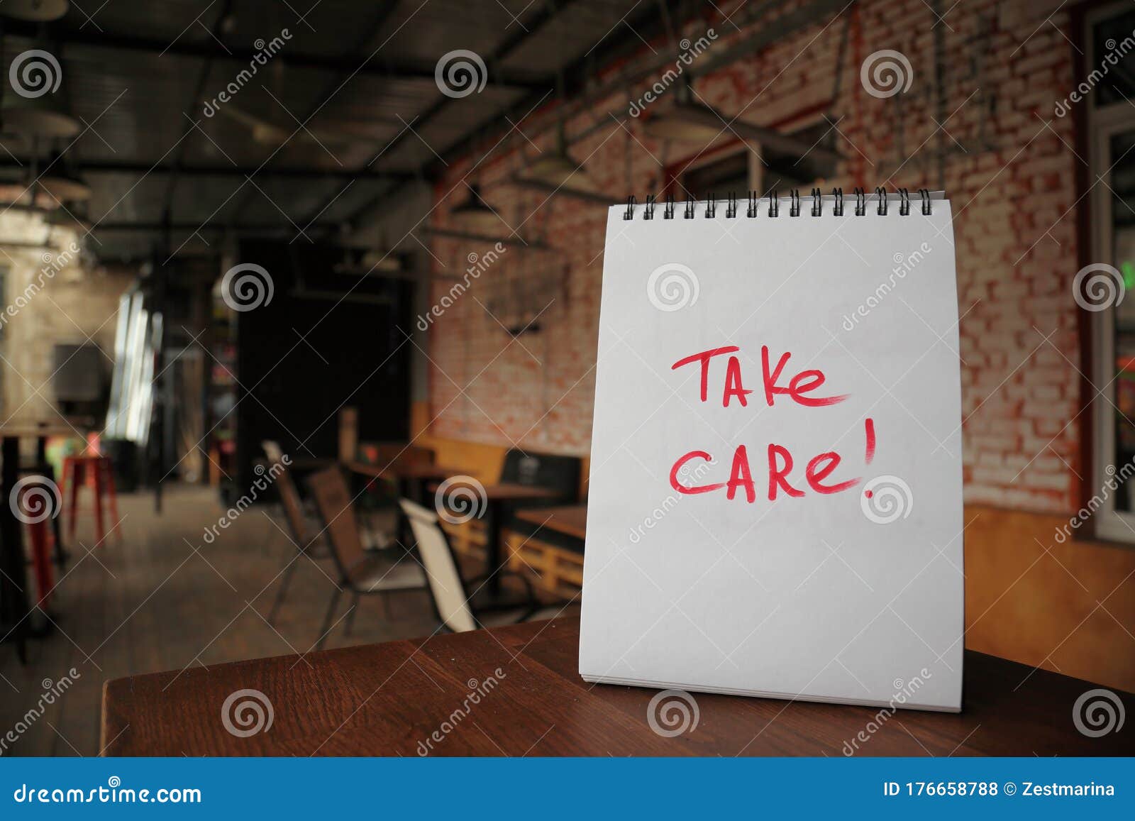 Take Care Text Written on a Paper on the Street Cafe Table Stock Photo ...