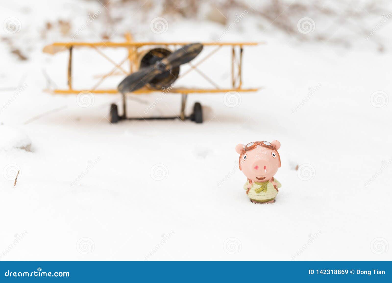 Piggy dolls in the snow stock image. Image of warmth - 142318869
